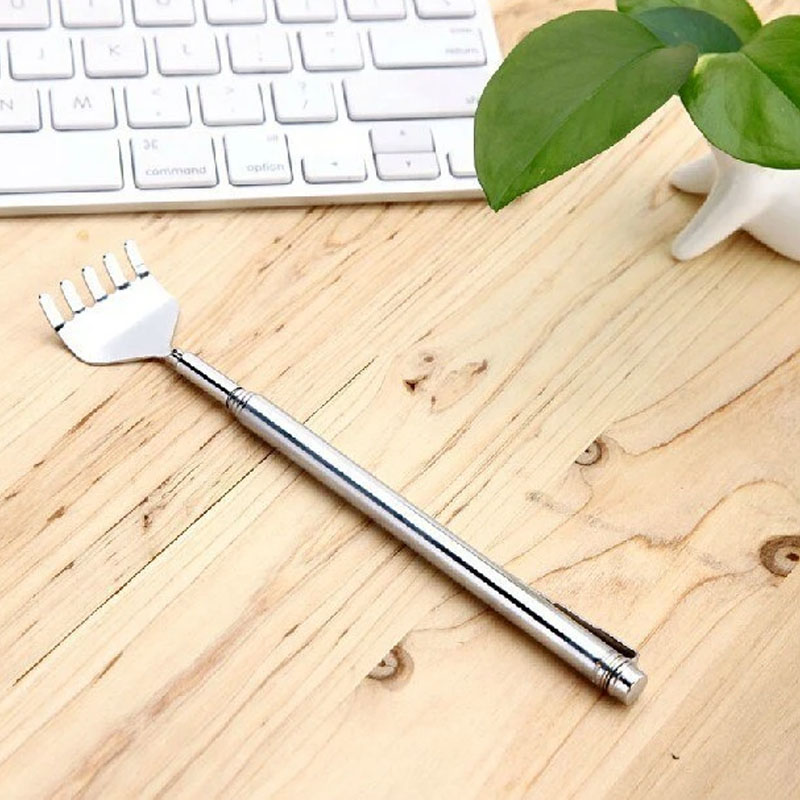 Gratte-dos malin en inox - www.zunik.fr - Yannick